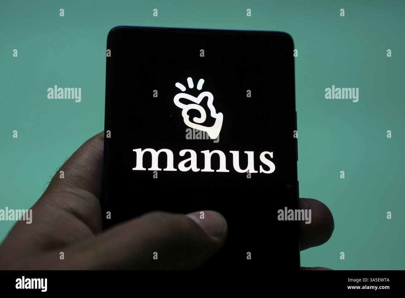 Close up of Manus logo on screen of mobile phone Stock Photo - Alamy
