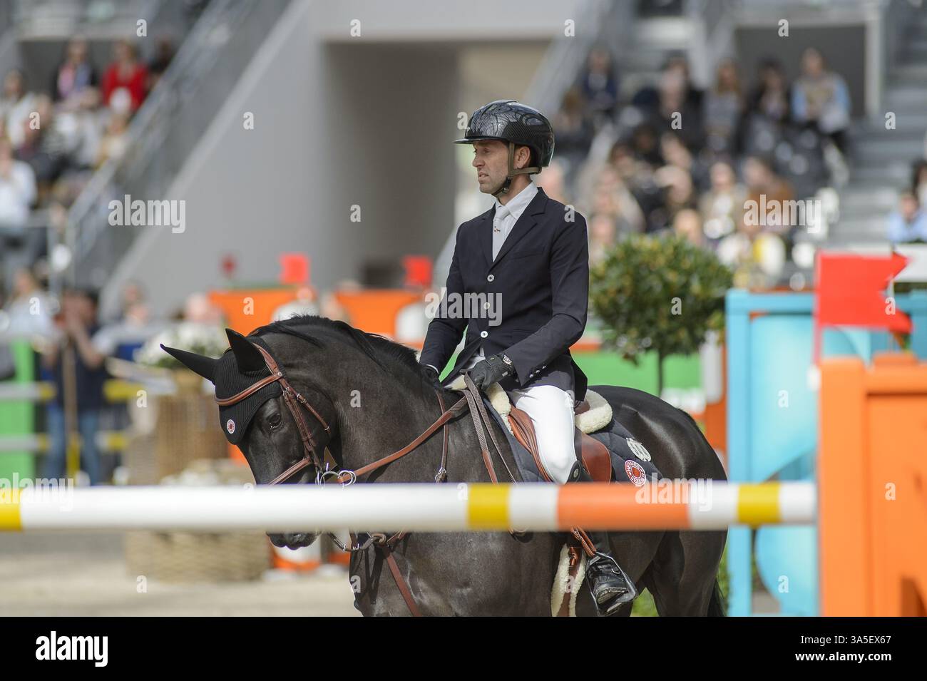 Simon DELESTRE (FRA) riding DEXTER FONTENIS Z during the Saut Hermes ...