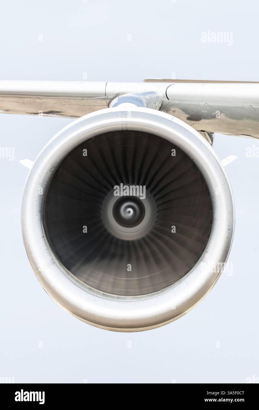 Jet engine on the airplane wing. Close-up frontal view of the jet ...