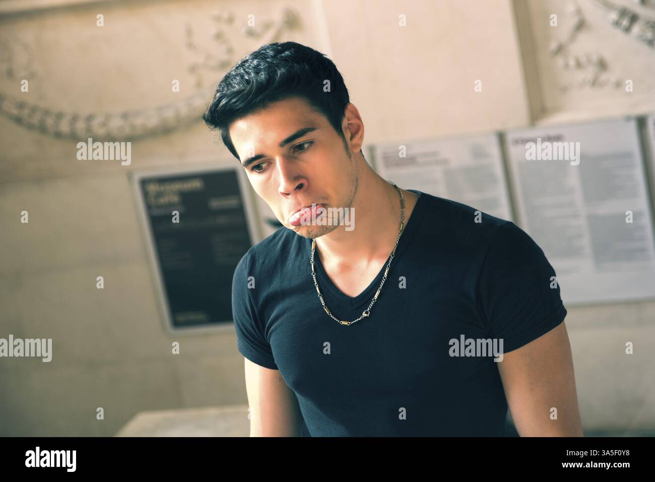 Close up Handsome Young Man in Plain Black Shirt Looking Down in Sad ...