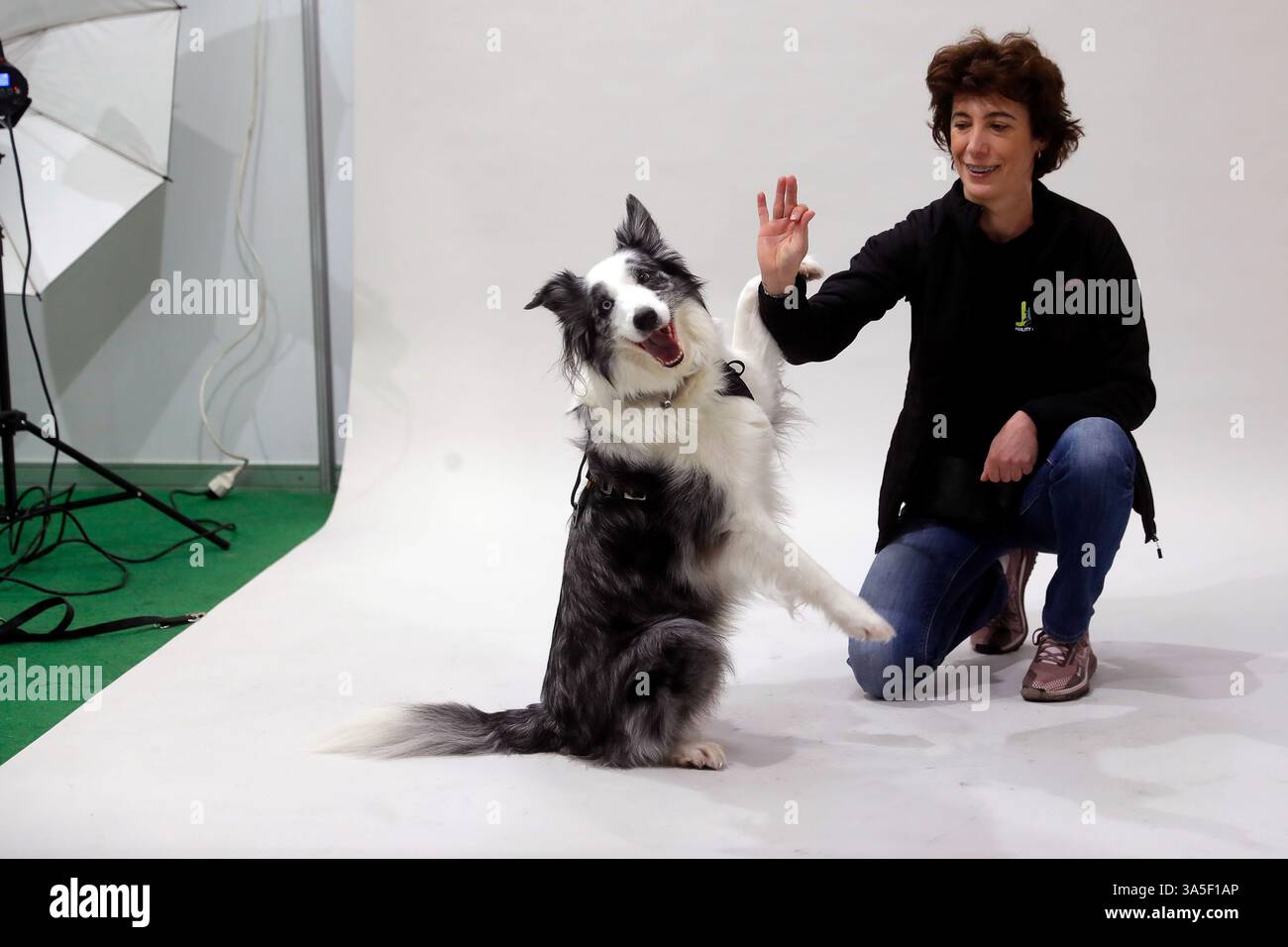 Bucharest, Romania. 22nd Mar, 2025. A woman poses with her Border ...