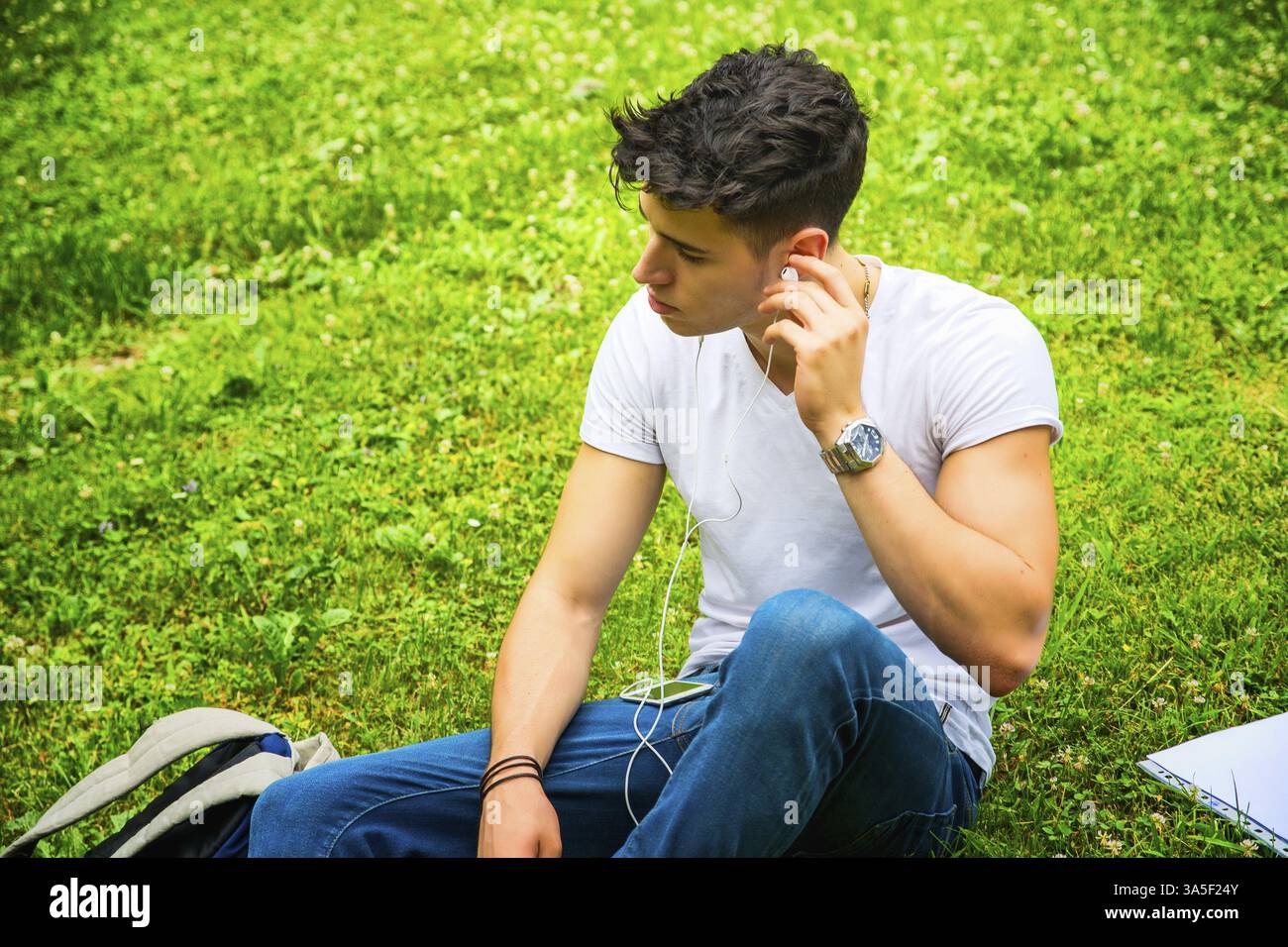 Close up Young Man Listening to his Favorite Music Using Headphone at ...