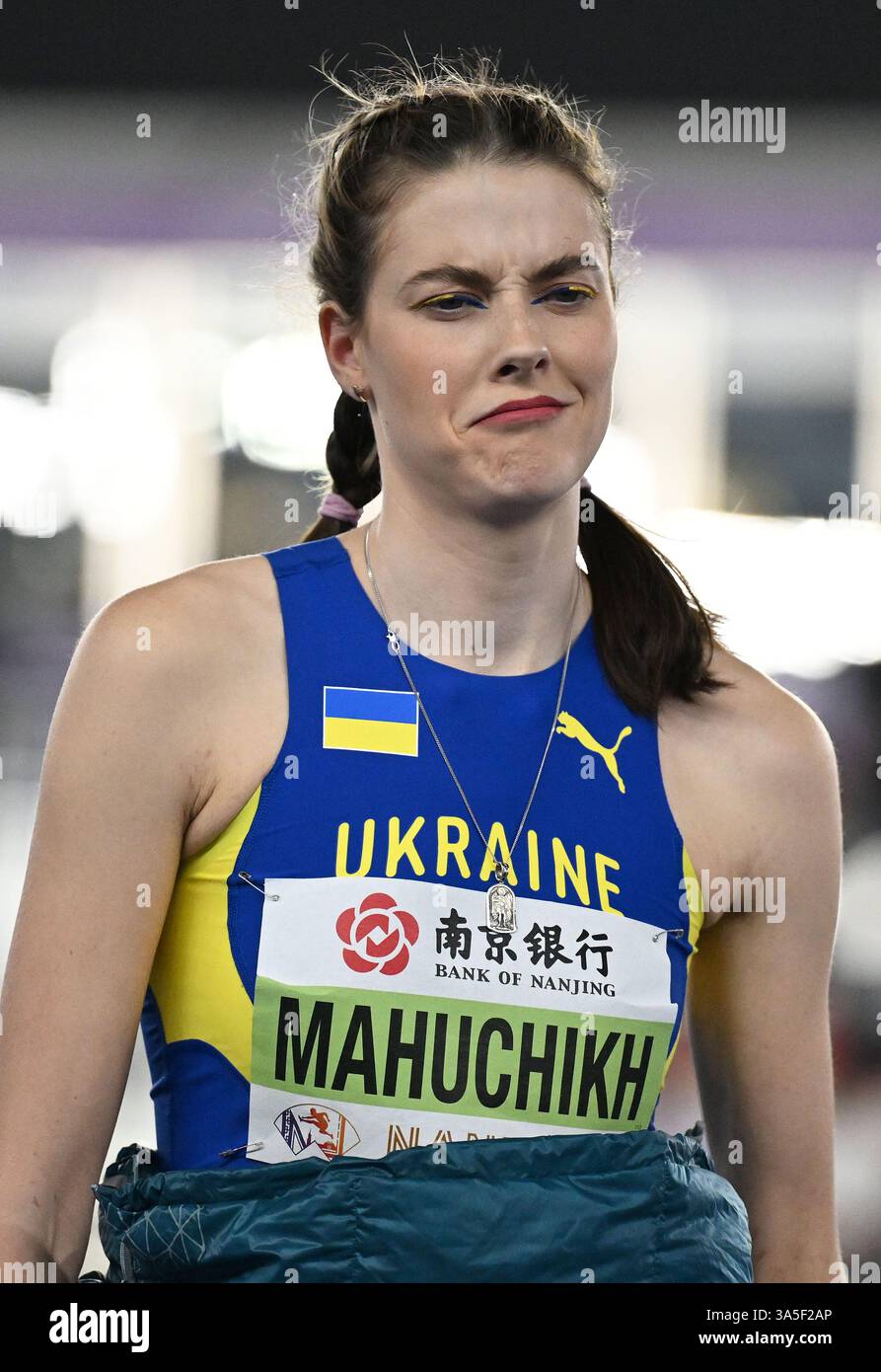 Nanjing, China's Jiangsu Province. 23rd Mar, 2025. Yaroslava Mahuchikh of Ukraine reacts during ...