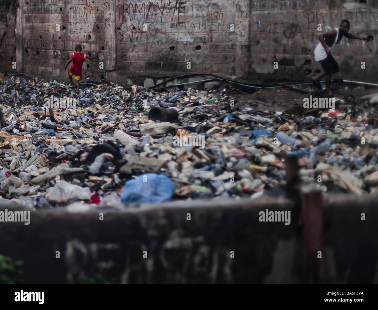 Residents caught between plastic waste on the streets of their ...