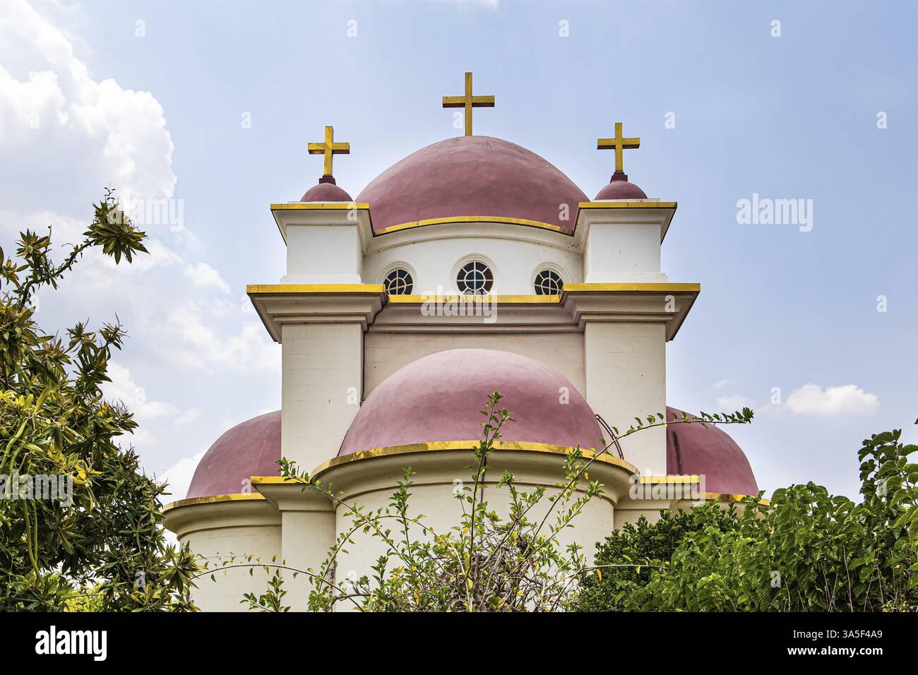 Pink domes and snow-white walls of the monastery of the 12 apostles ...