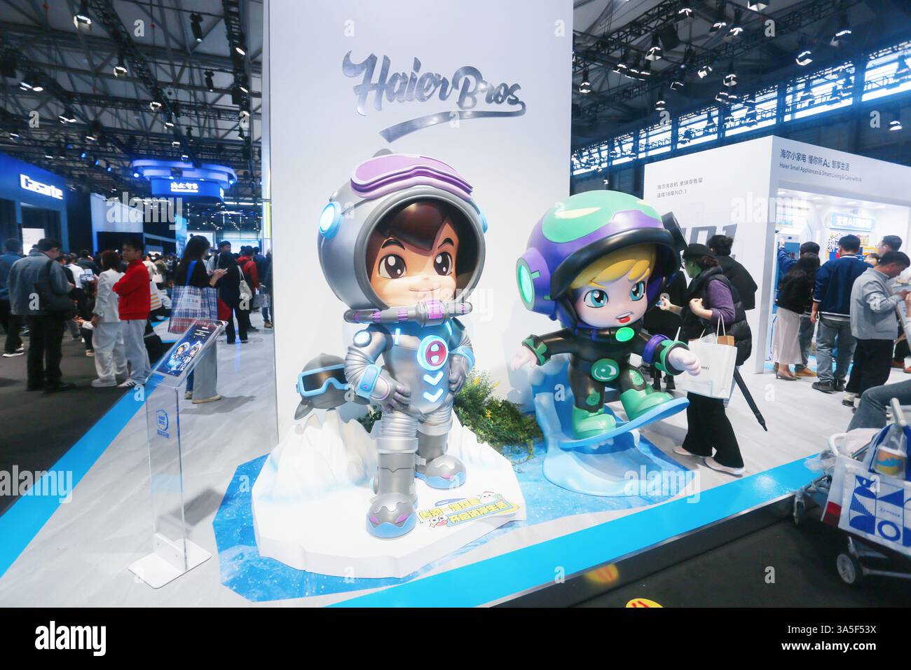 Visitors visit the booth of Haier Group at 2025AWE in Shanghai, China ...