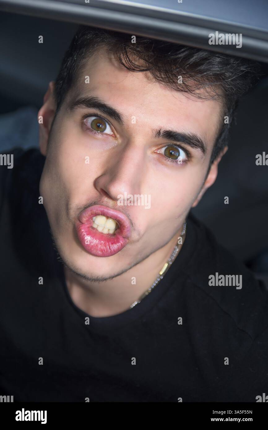 Close up Funny Face of a Young Handsome Man Showing Exaggerated Pouting ...