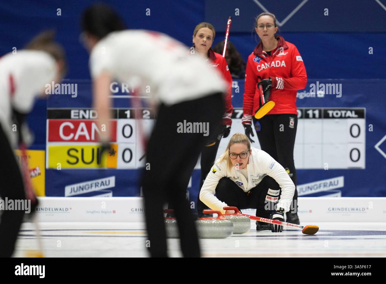 Switzerland's Alina Paetz calls the sweep during the gold medal match ...