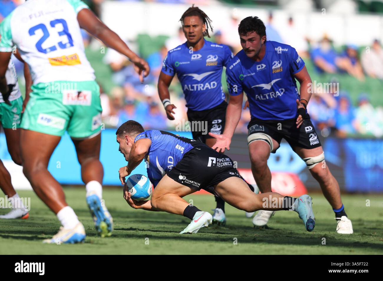 Perth, Australia. 23rd Mar, 2025. Nic Dolly of the Western Force drives ...