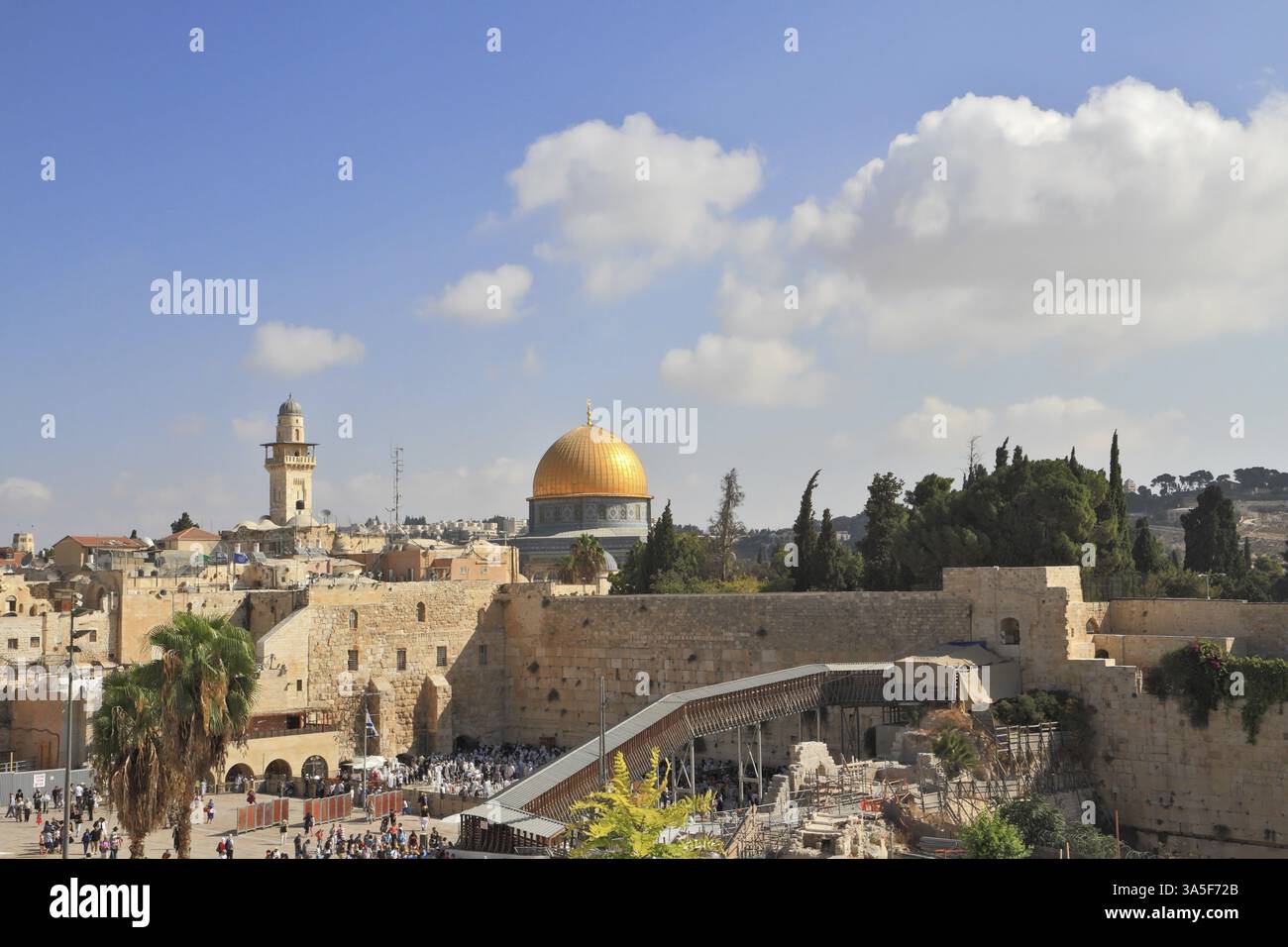 The Western Wall of the Temple and the Mosque of Omar. The golden dome ...