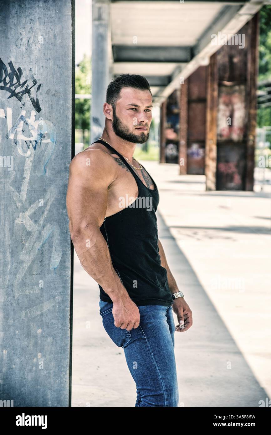 Handsome Muscular Hunk Man Outdoor in City Setting. Showing Healthy ...