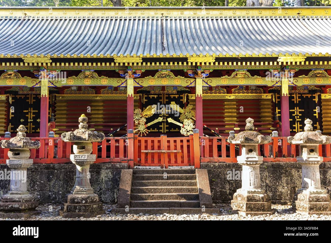 The even rows of stone sculptures - lanterns. Nikko Tosho-gu is a ...