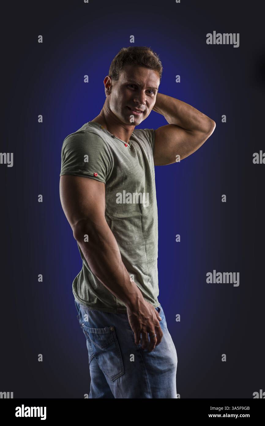 Handsome muscular fit young man, looking at camera with a smile Stock ...