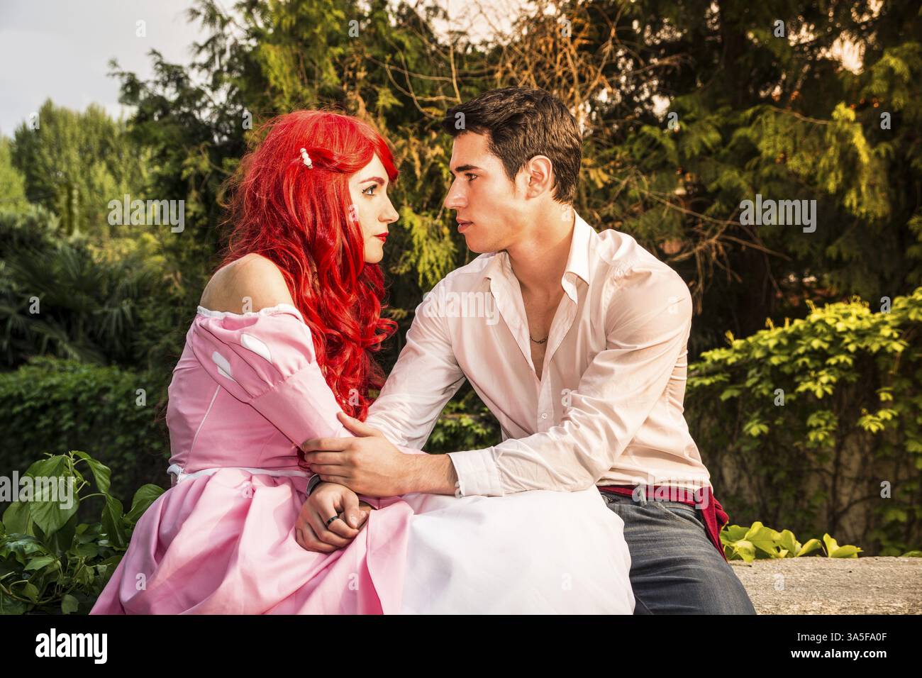 Romantic Fairy Tale Couple Sitting on Rocks at River Side in Peaceful ...