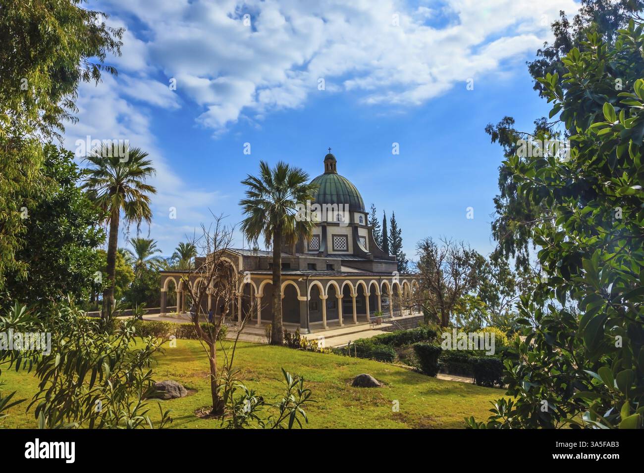 Israel, Sea of Galilee Beach. Dome and colonnade surrounded by a park ...