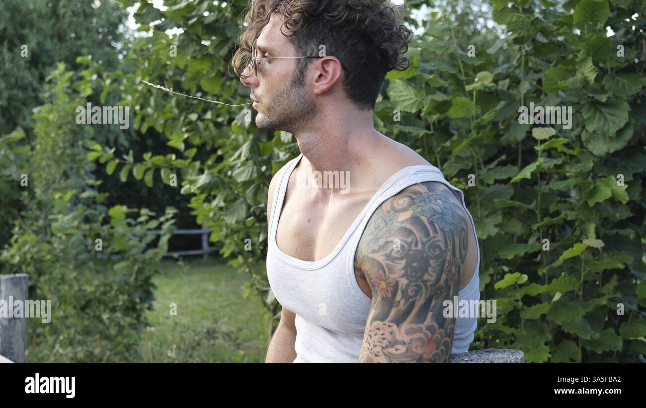Handsome Muscular Hunk Man Outdoor in Countryside Standing on Grass ...