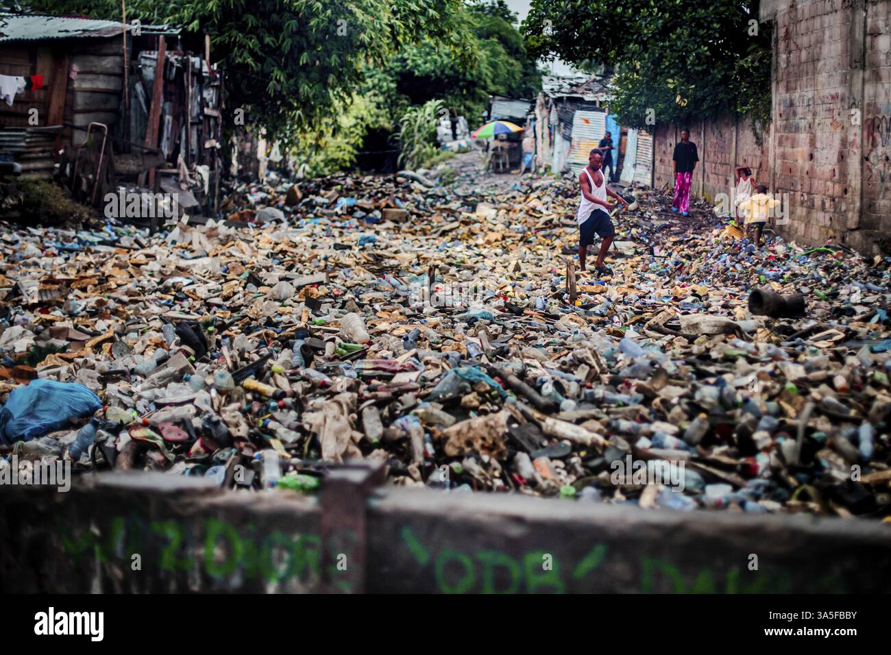 Residents caught between plastic waste on the streets of their ...
