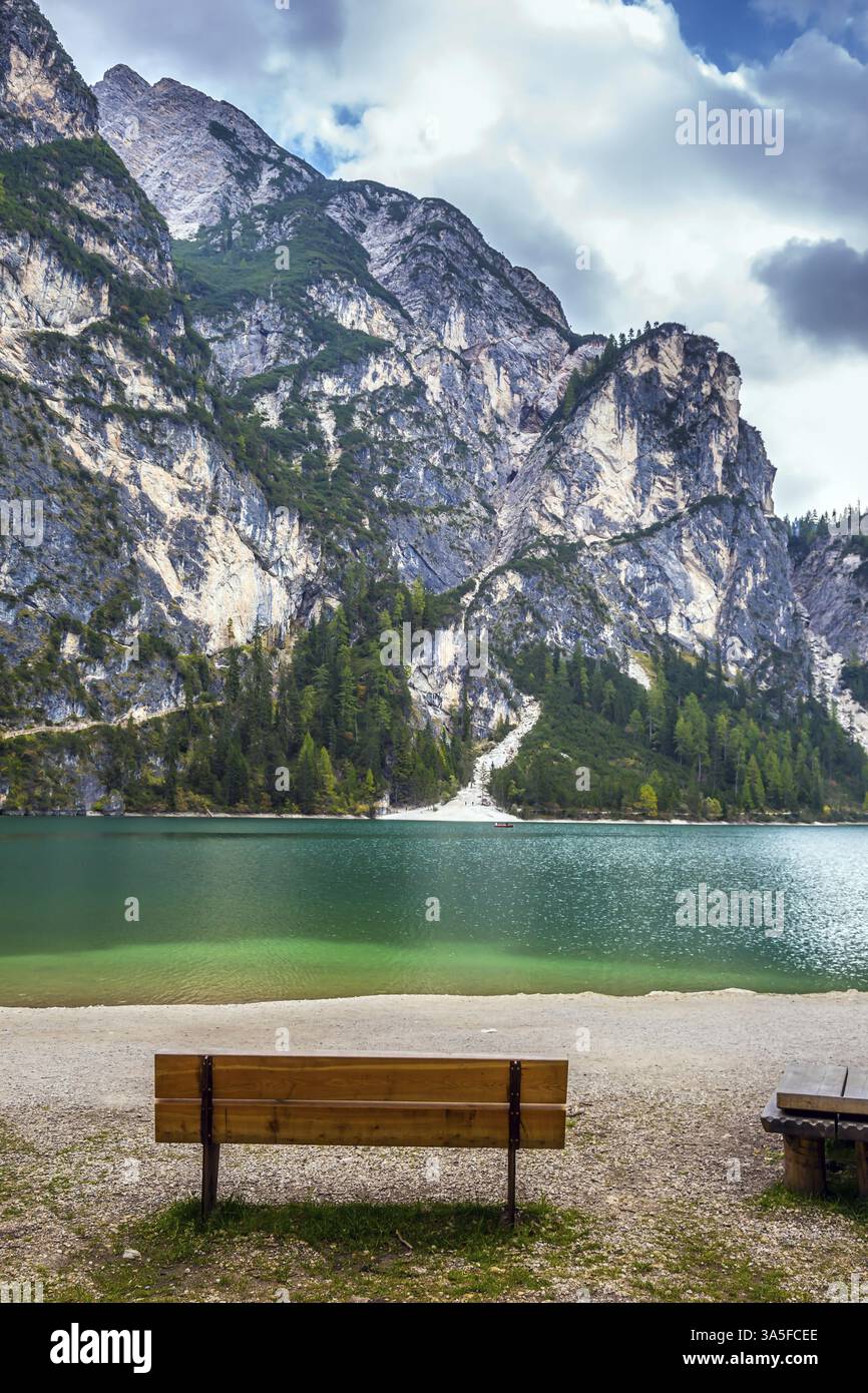 Bench on lake beach. Magnificent lake in South Tyrol, Italy. The ...