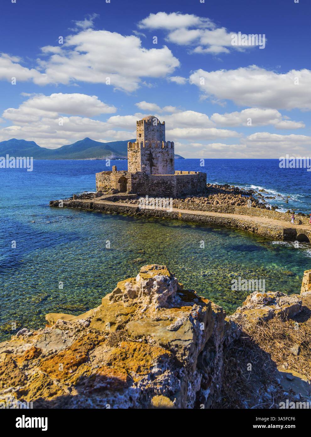 Beautiful seaside resort in Greece Mediterranean. Venetian fort castle ...