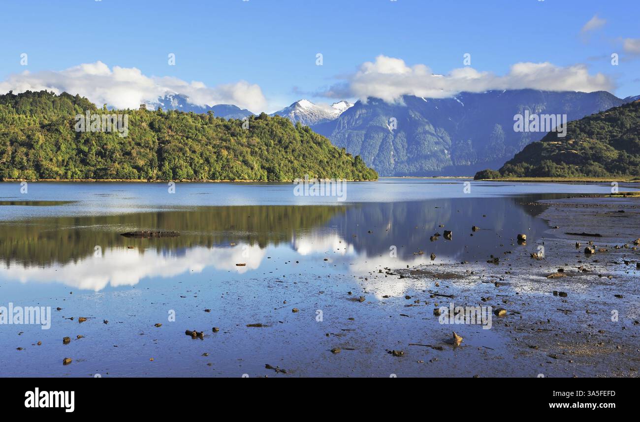 A wonderful summer day in the shallow river. Stony shallows. Chilean ...