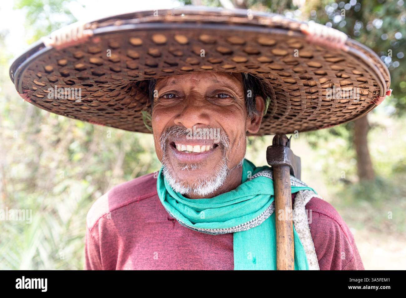 Local man, a shepherd with interesting straw hat posing by the road ...