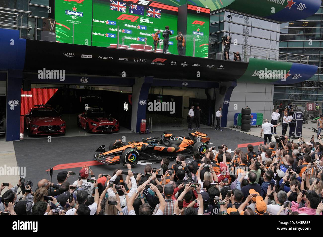 McLaren driver Oscar Piastri of Australia, McLaren driver Lando Norris of Britain, and Mercedes ...