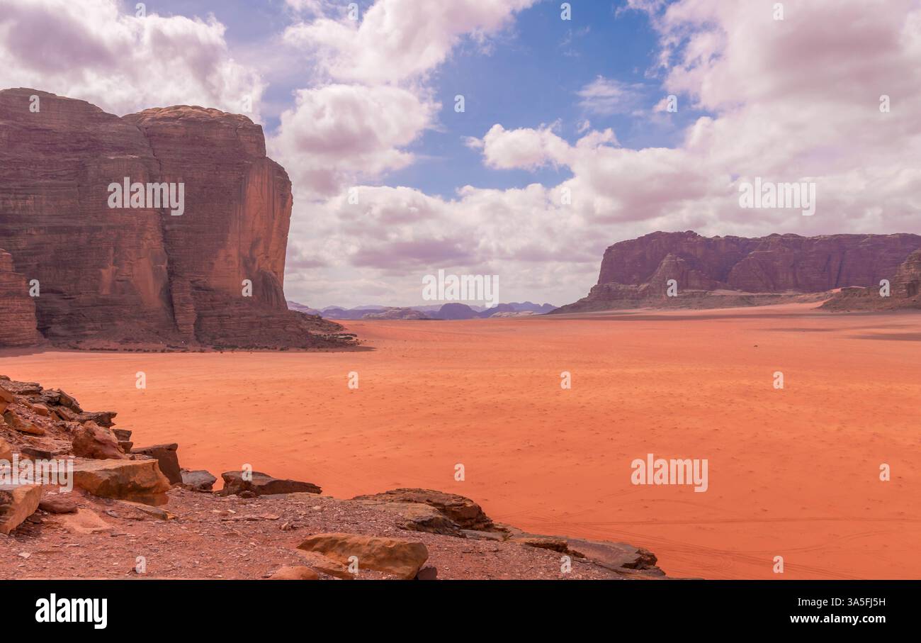 A stunning view of Wadi Rum, Jordan, featuring dramatic red sandstone ...