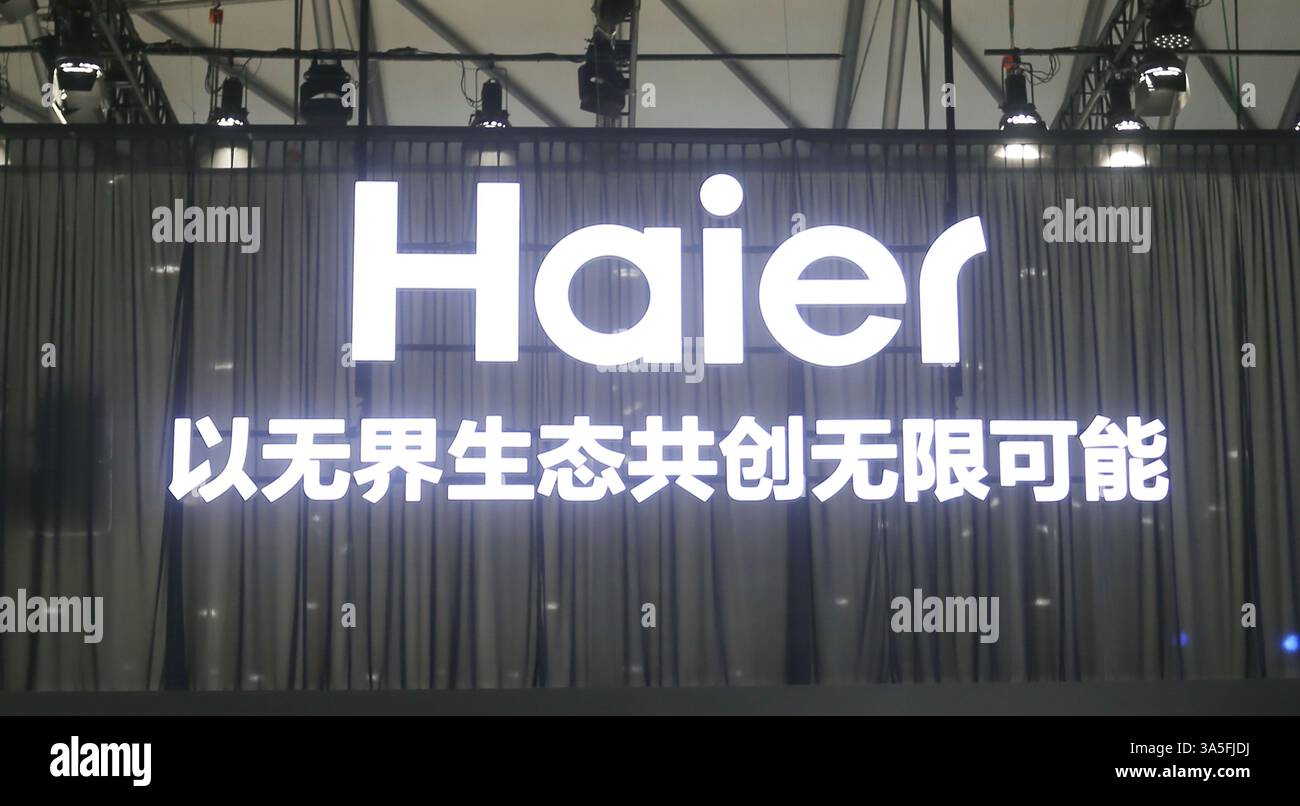 Shanghai, China. 20th Mar, 2025. Visitors visit the booth of Haier ...
