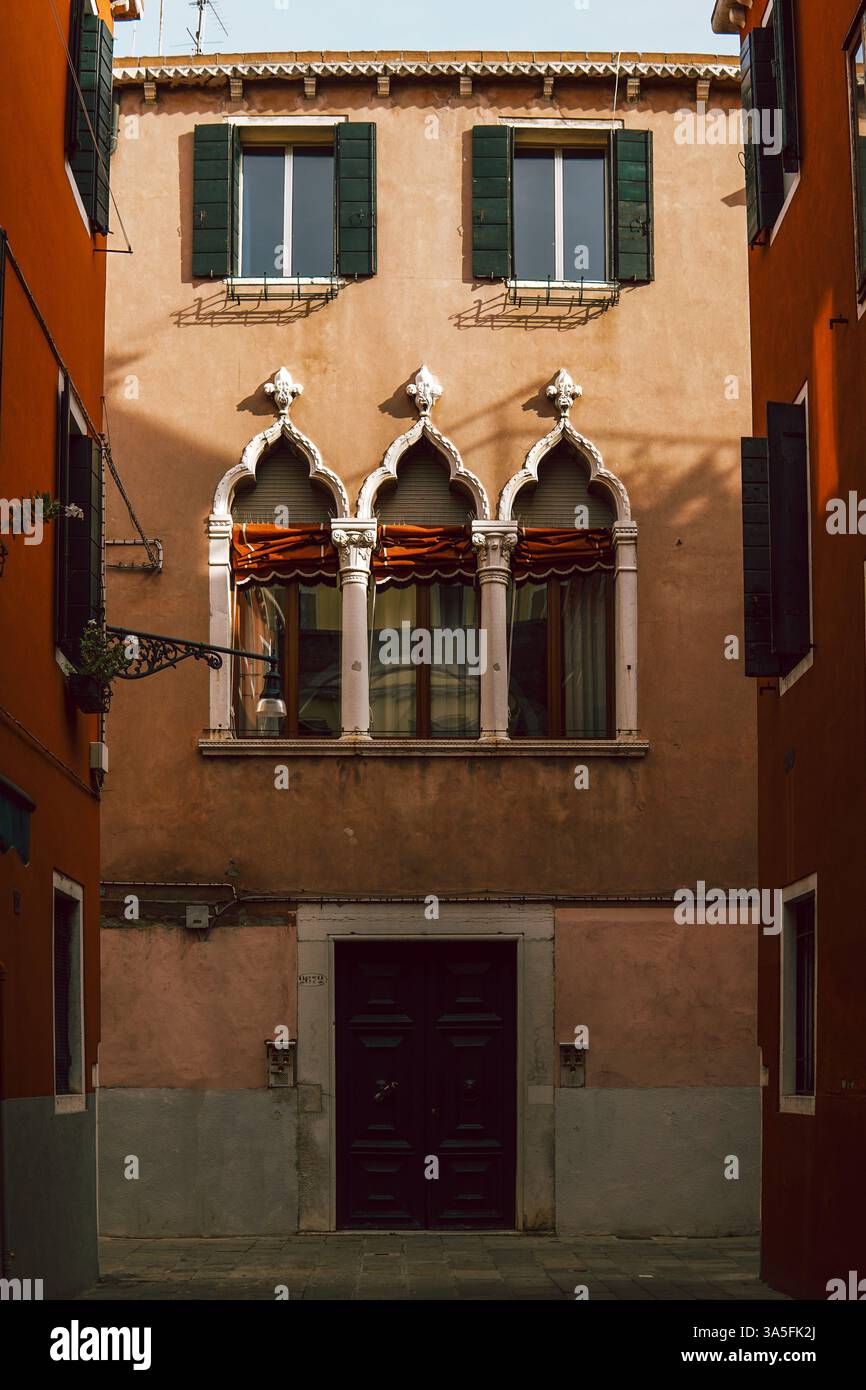 Classic Venetian architecture: colorful facades, arched windows ...