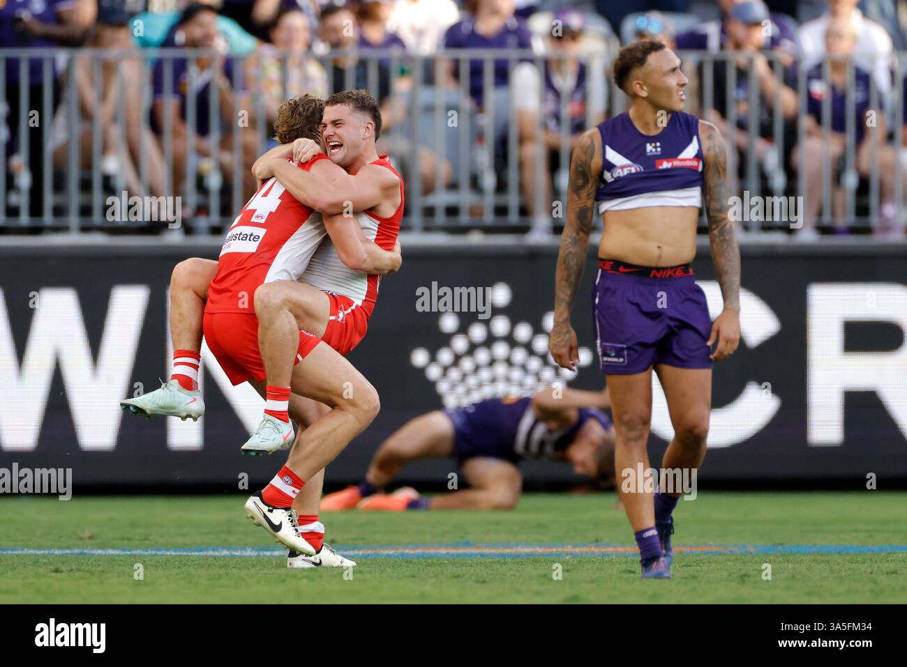 Tom Papley and Dane Rampe of the Swans celebrate after winning during ...