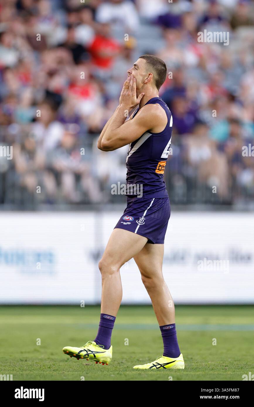 Perth, Australia. 23rd Mar, 2025. Patrick Voss of the Dockers reacts ...