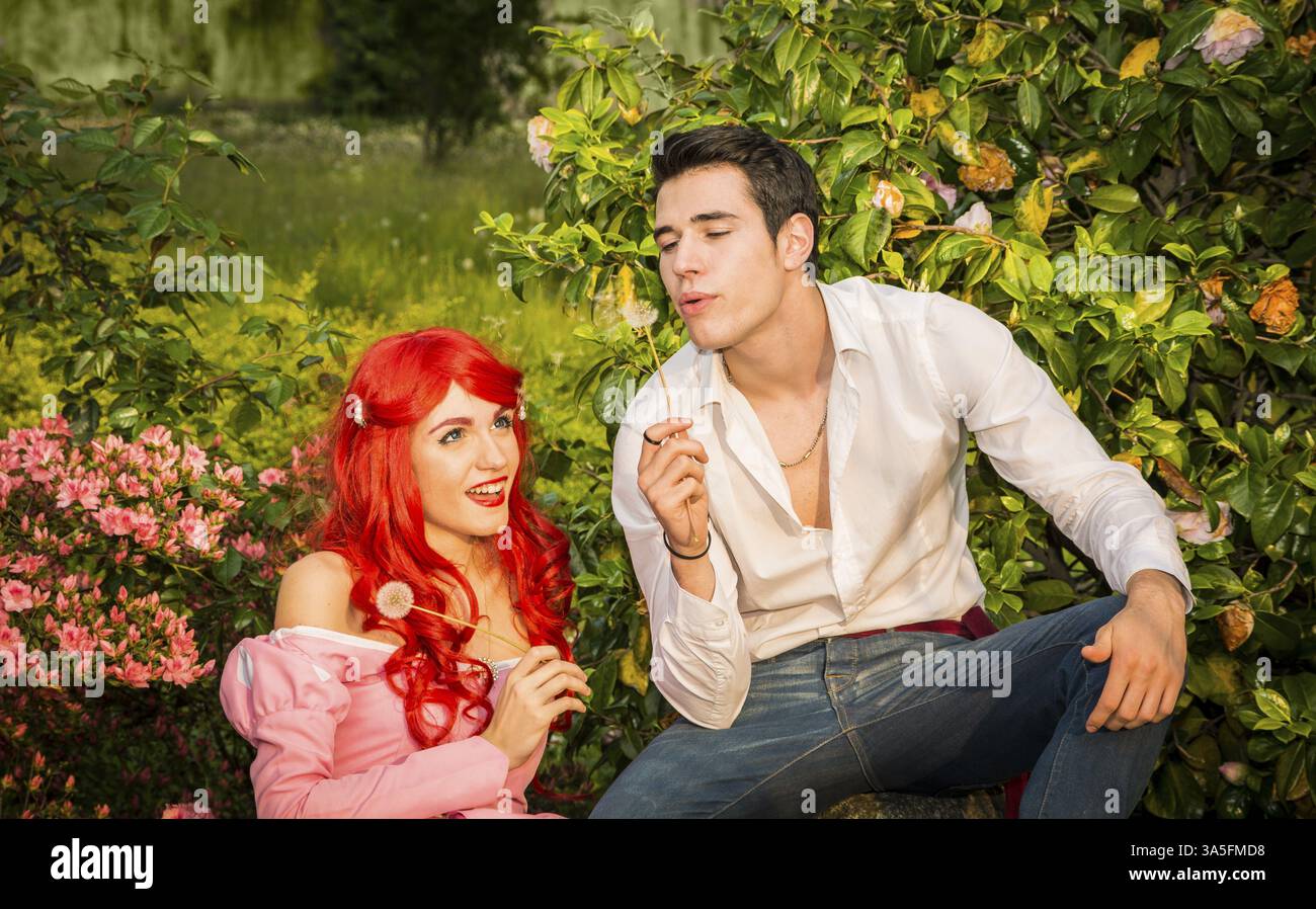 Romantic Fairy Tale Couple Sitting on Rocks at River Side in Peaceful ...