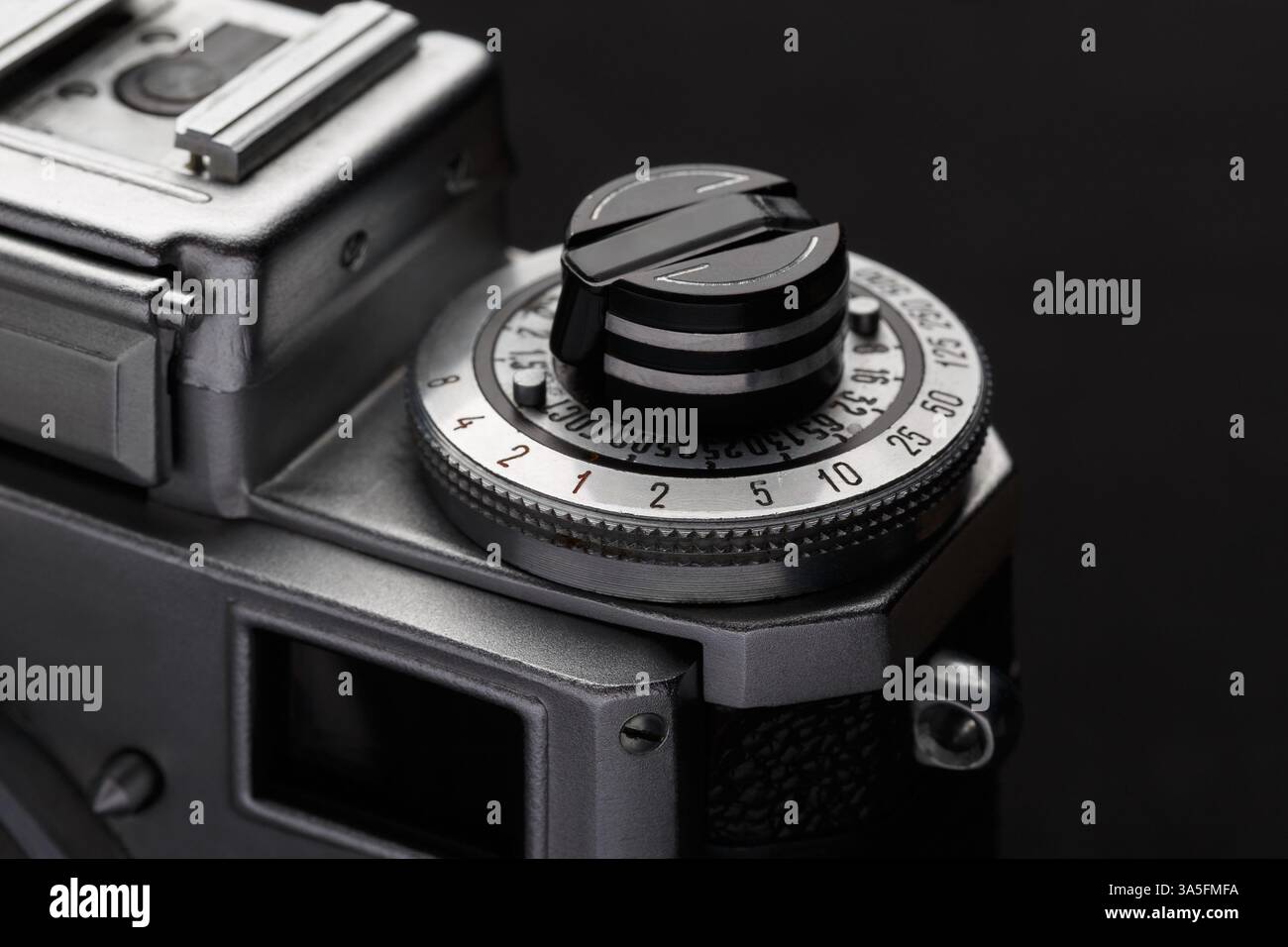 Close-up of shutter speed and ISO setting mechanism of an old ...