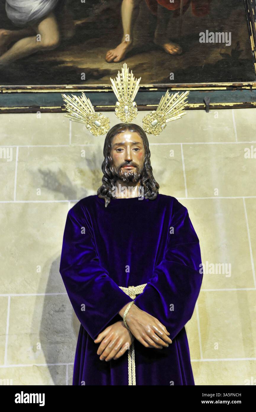 Statue of Jesus in purple robe with halo of golden rays, Iglesia de ...