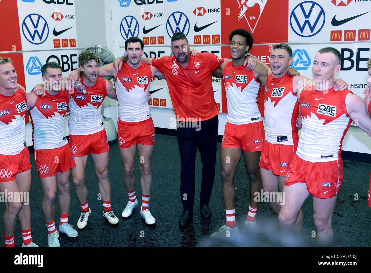 Dean Cox, head coach of the Sydney Swans celebrates with his players ...