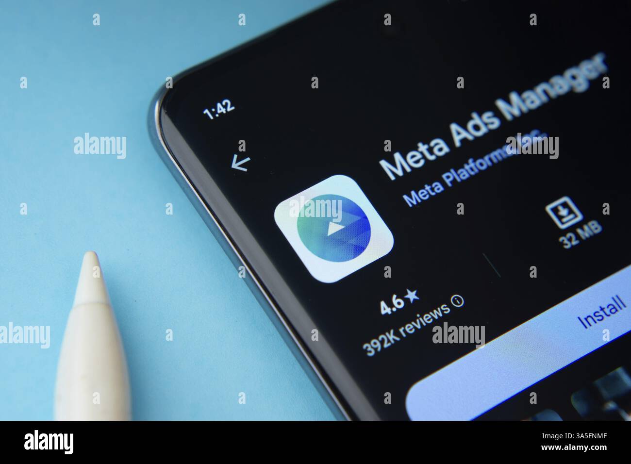 The meta ads manager app from Google Playstore is displayed on a ...