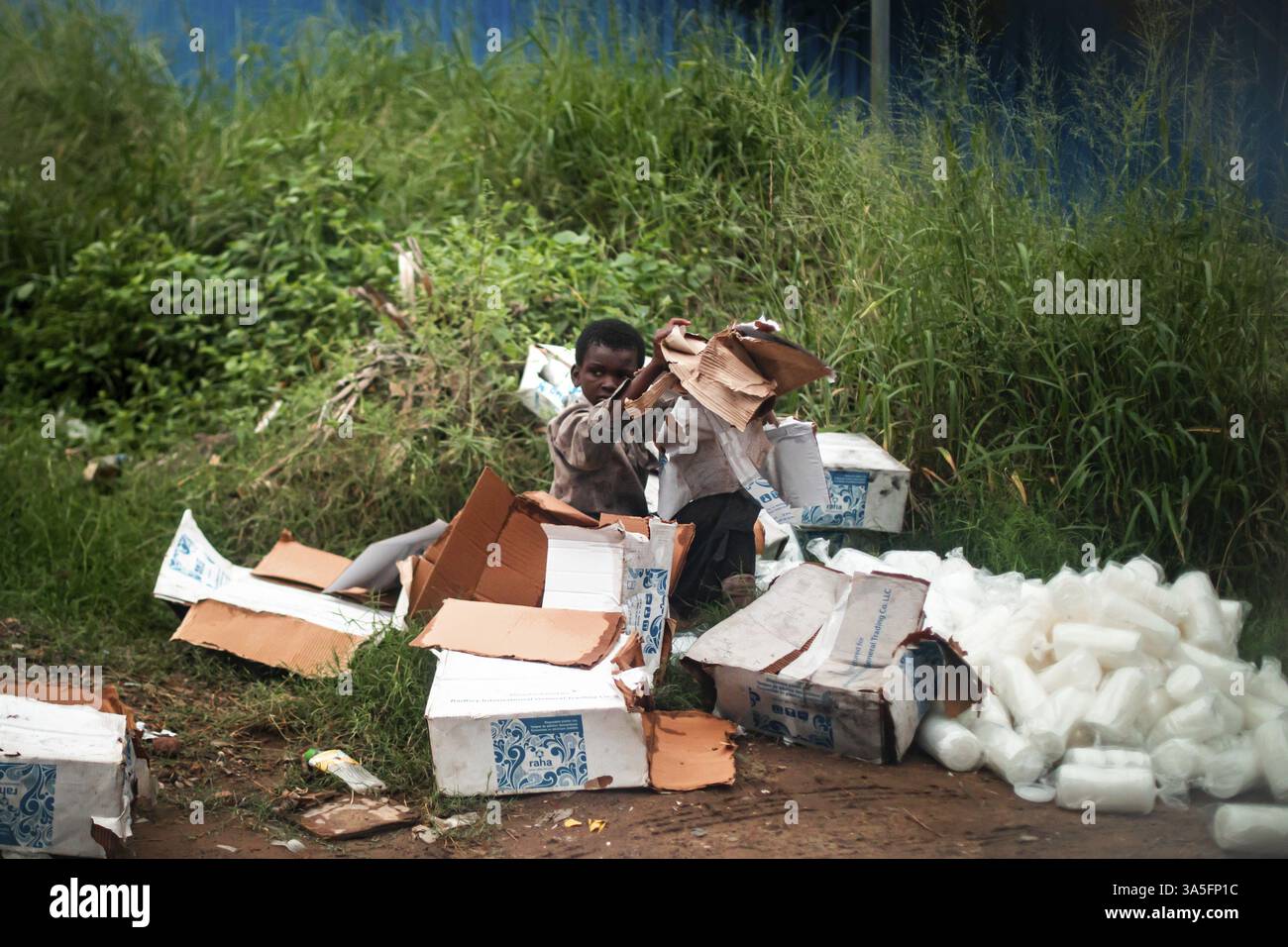 Child caught between plastic waste, pollution and poverty Kinshasa ...