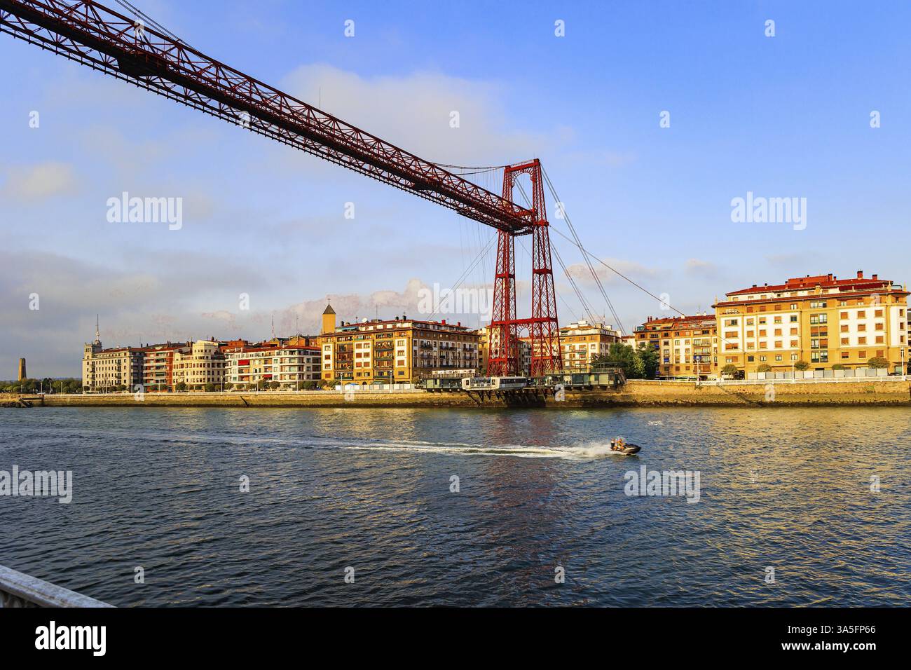 The famous unique outboard ferry. Flying ferry across the Nervion River ...