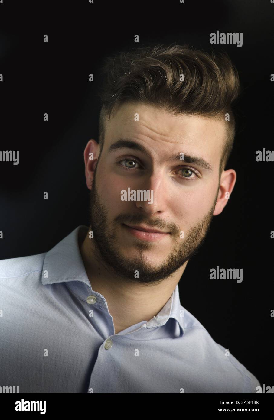 Portrait of attractive young man with nice expression, isolated on ...