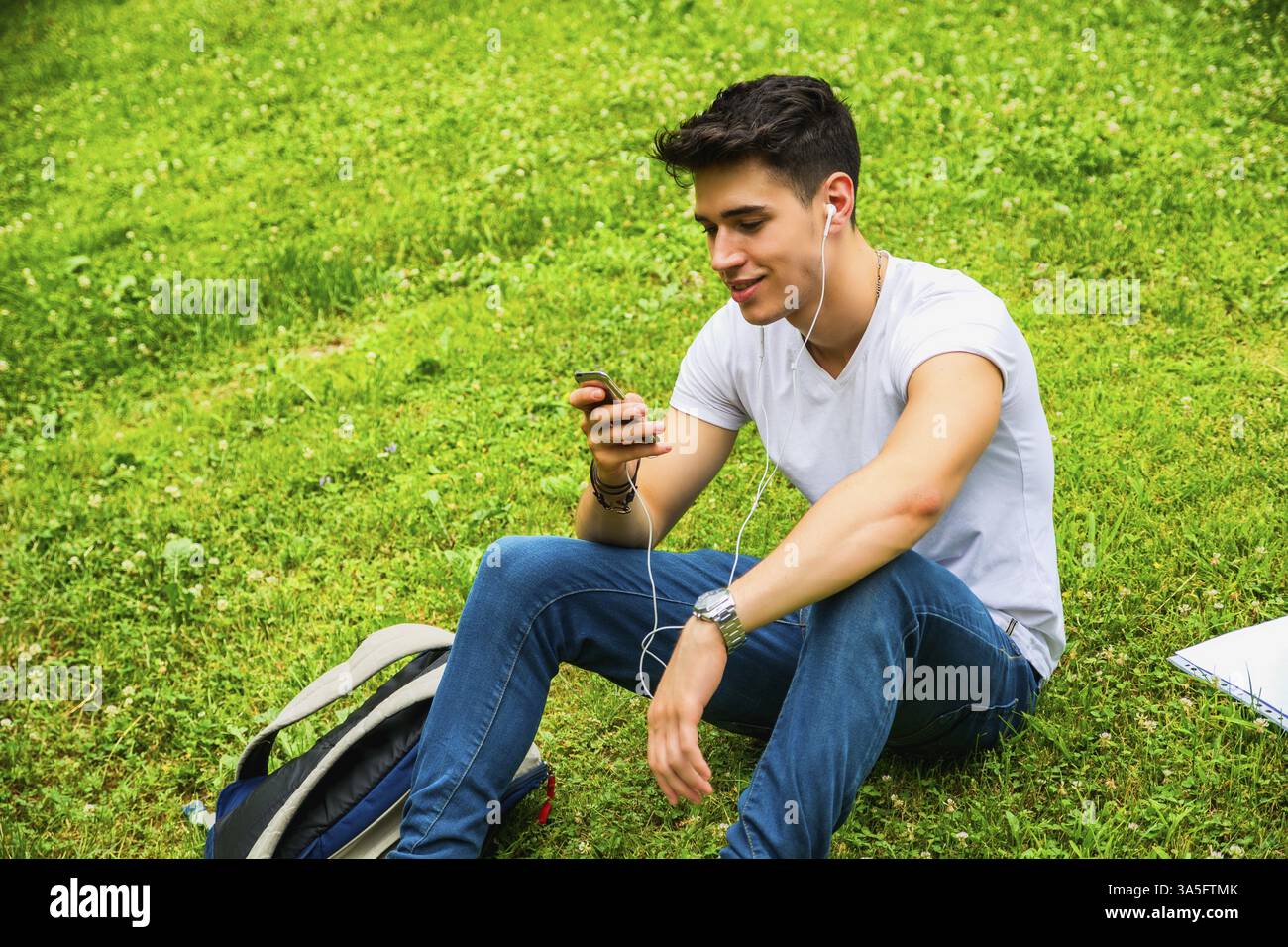 Close up Young Man Listening to his Favorite Music Using Headphone at ...