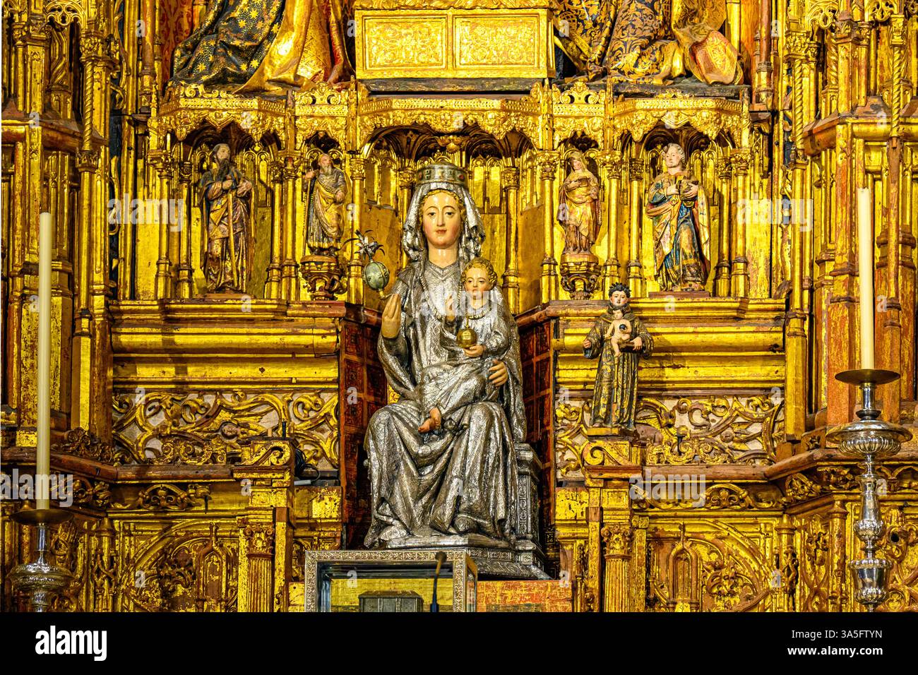 A sculpture or figure of the Virgin Mary with baby Jesus, interior ...