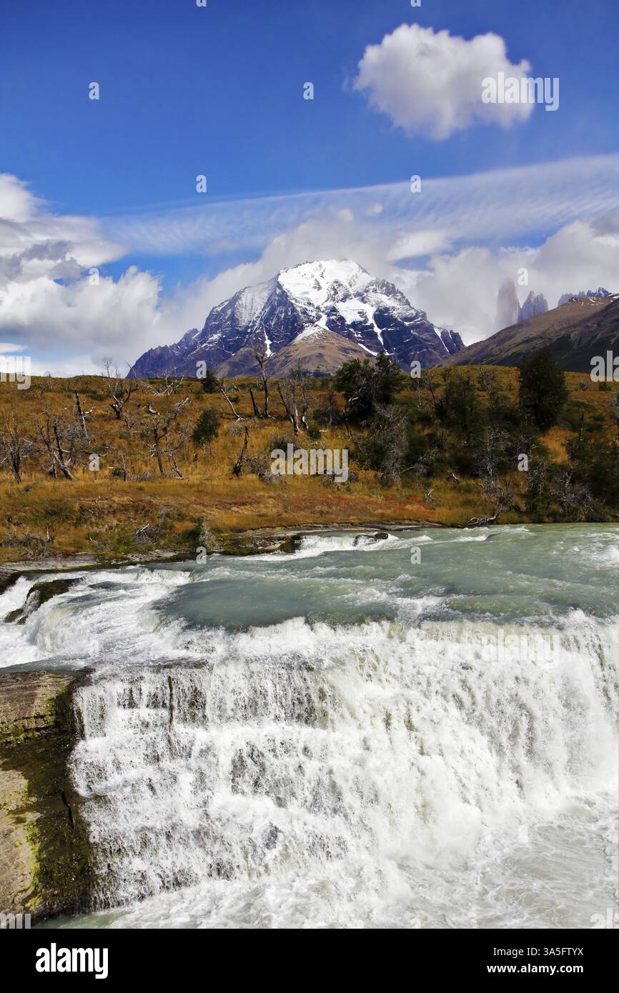 South of Chile. Scenic powerful and high-water waterfall Cascades Paine ...