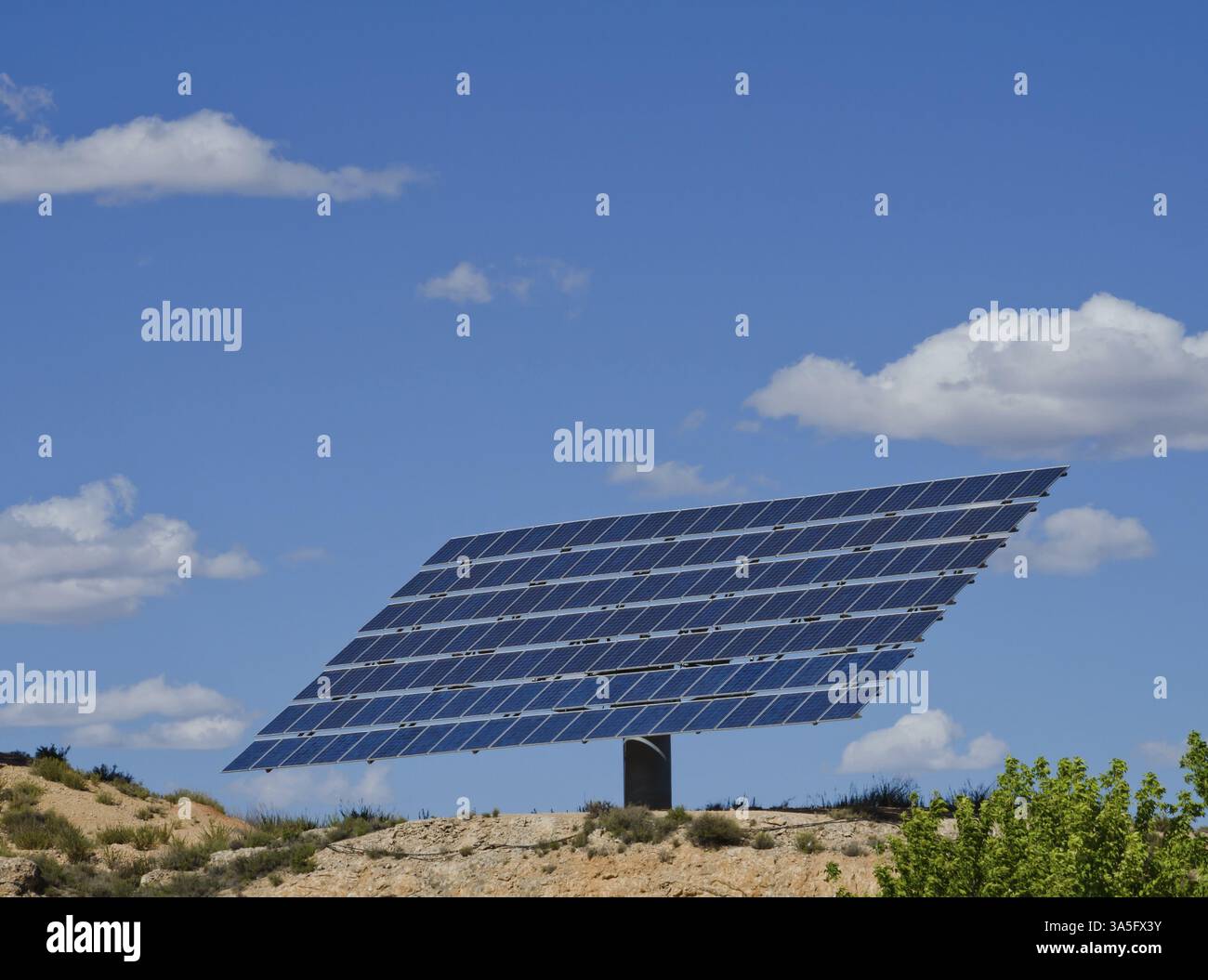 Large photovoltaic solar panel against blue sky Stock Photo - Alamy