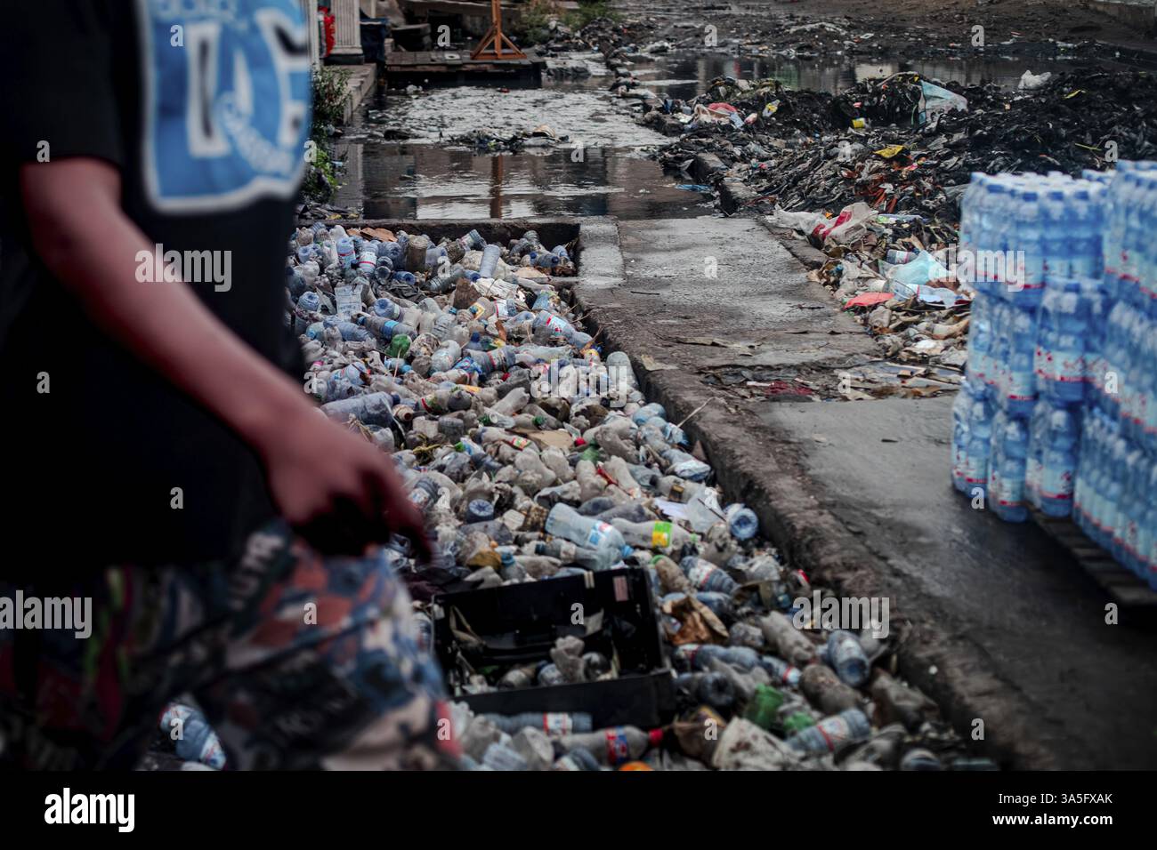 Residents caught between plastic waste on the streets of their ...