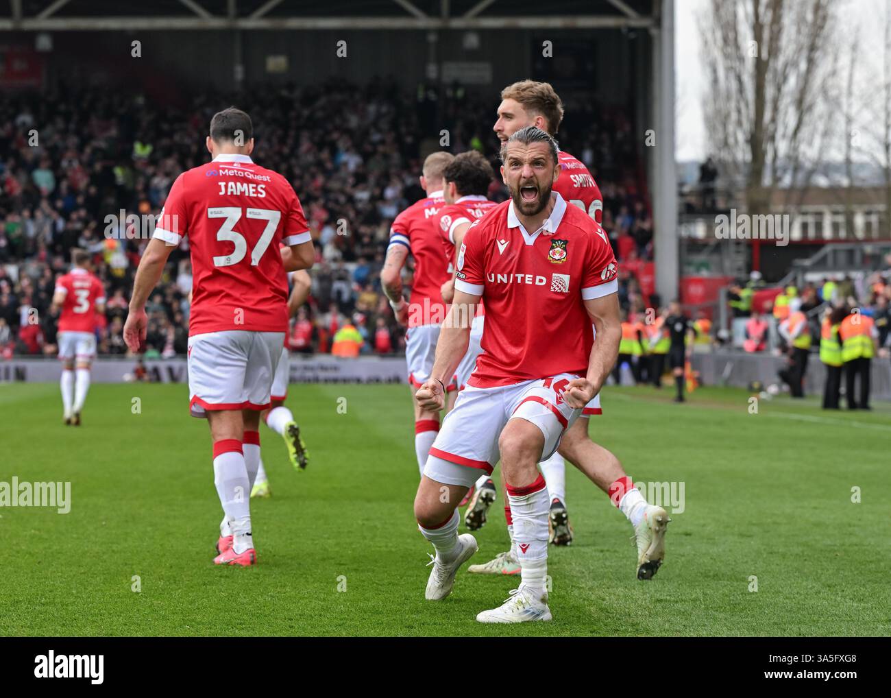 Wrexham's Jay Rodriguez celebrates scoring their side's first goal of ...