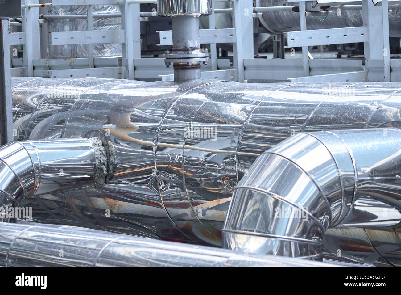 Pipelines and infrastructure in a chemical plant illustrating ...