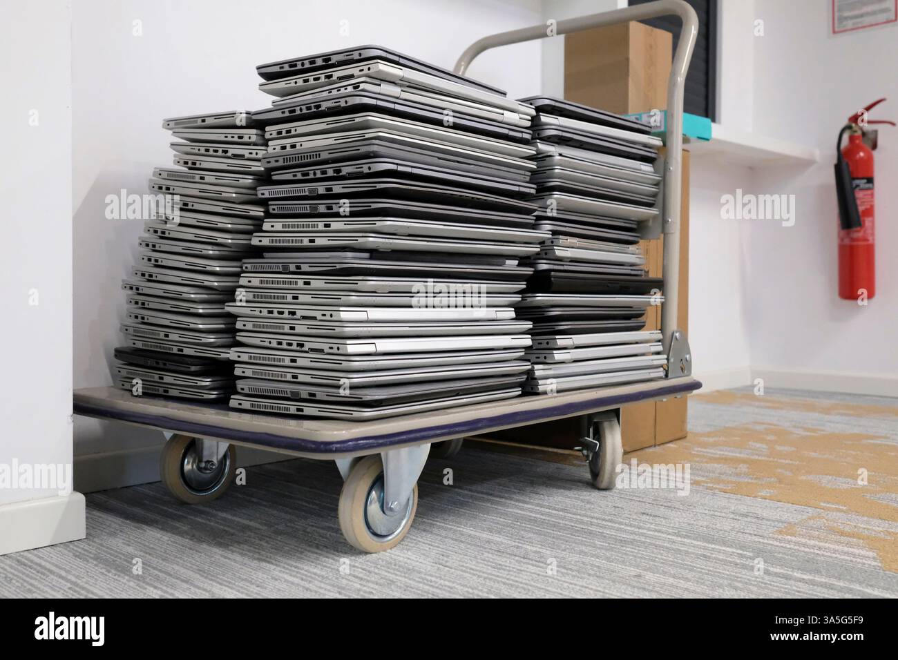 Electronic waste - stack of laptops to be discarded Stock Photo - Alamy