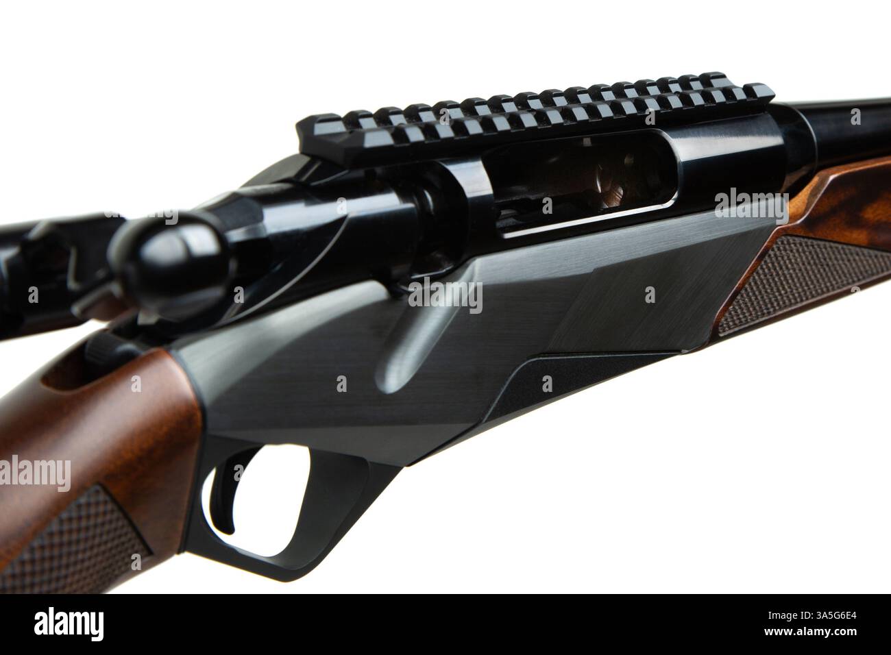 A detailed close-up of a hunting rifle with a wooden stock, black metal ...