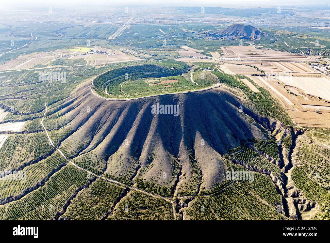 Aerial view of an eroded extinct volcano in the volcano geologic park ...
