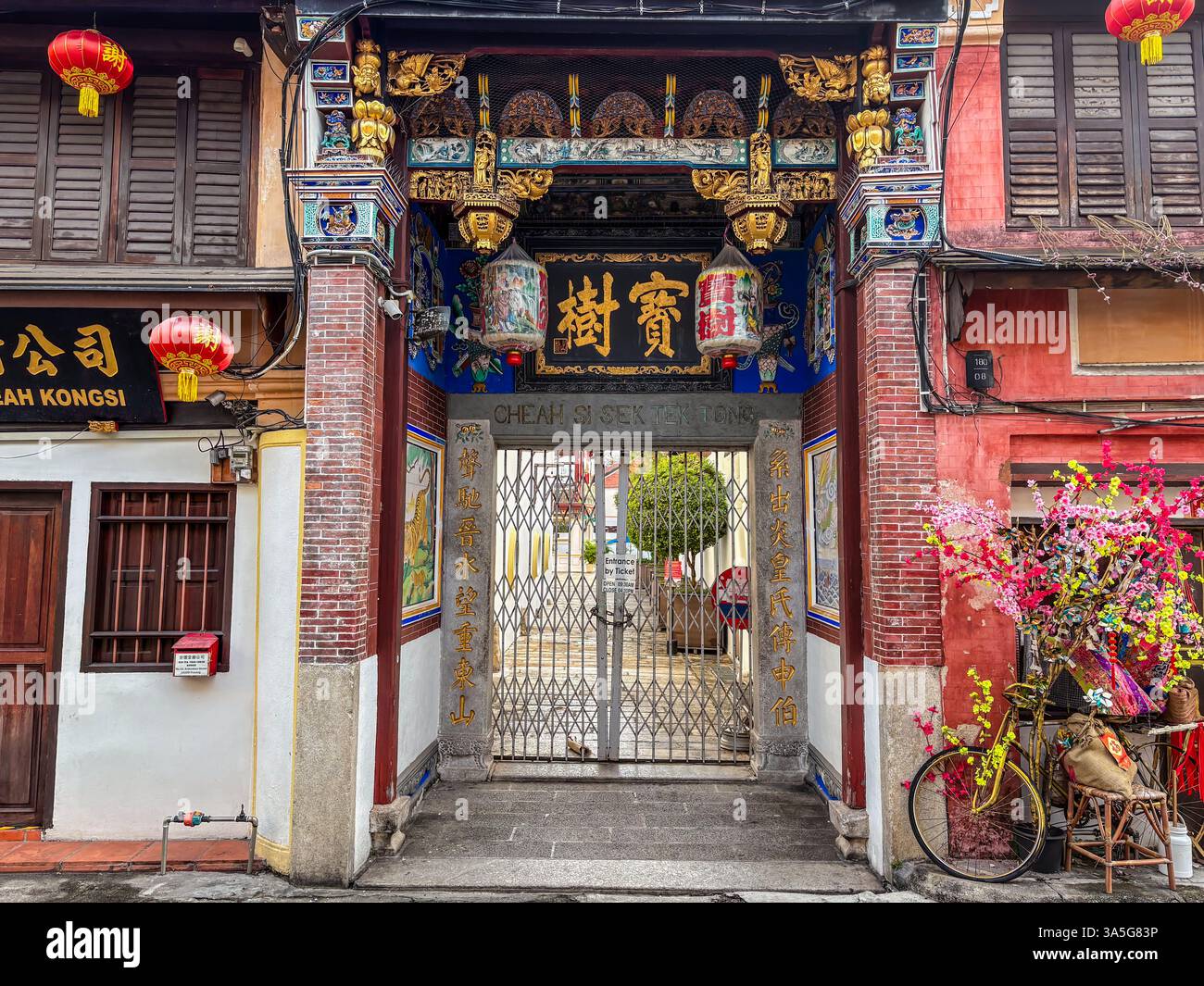 Ornate and colorful entrance gate to Cheah Kongsi clan house in George ...